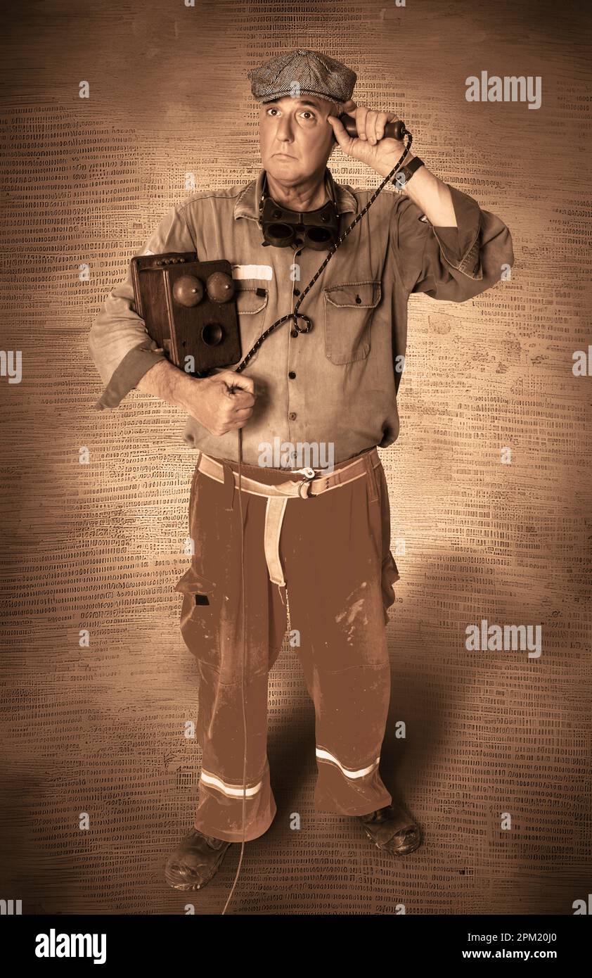 Vintage style portrait on a callout tradesman taking bells box phone ...