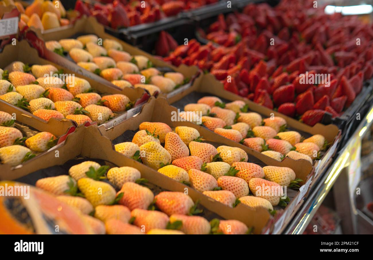 Pink Strawberry on the farmers market stall Stock Photo - Alamy