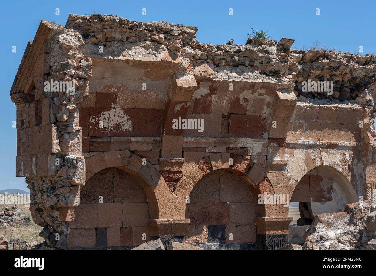 The stonework of a ruined church at the ancient city of Ani in eastern ...