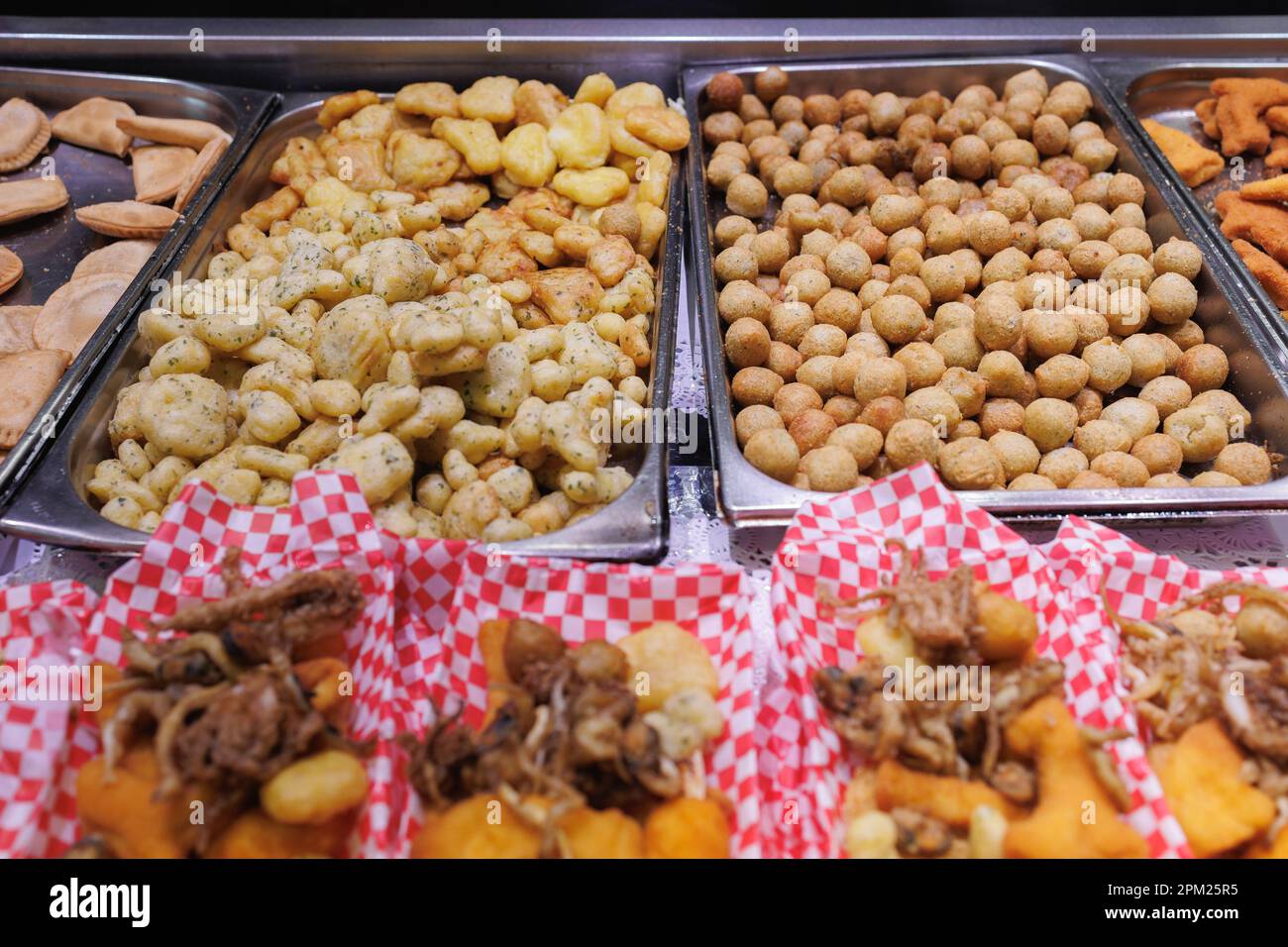 Fried Fish Nuggets in Various Shapes Inside Trays Stock Photo - Alamy
