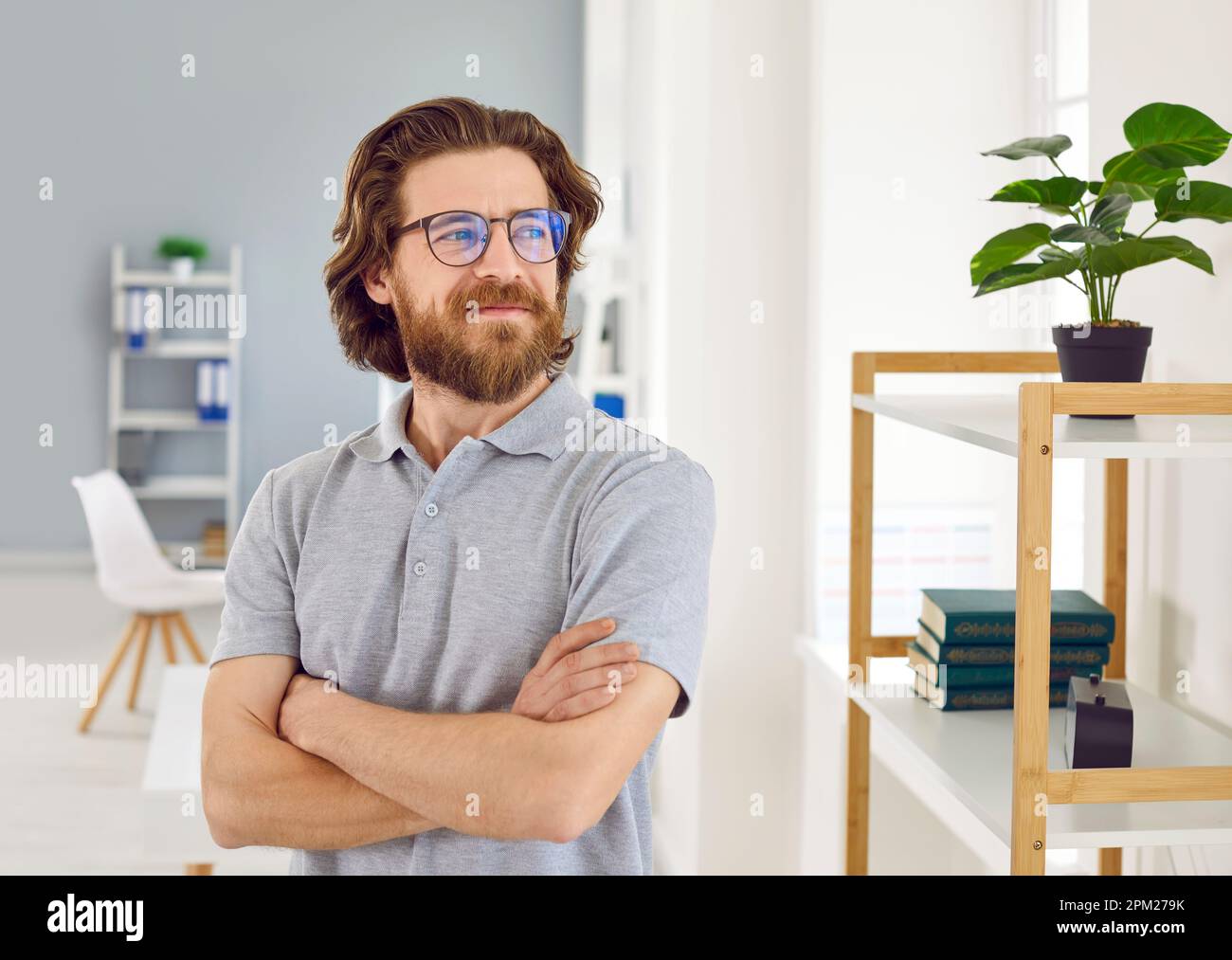 Portrait of confident satisfied business man looking away reflecting on ...