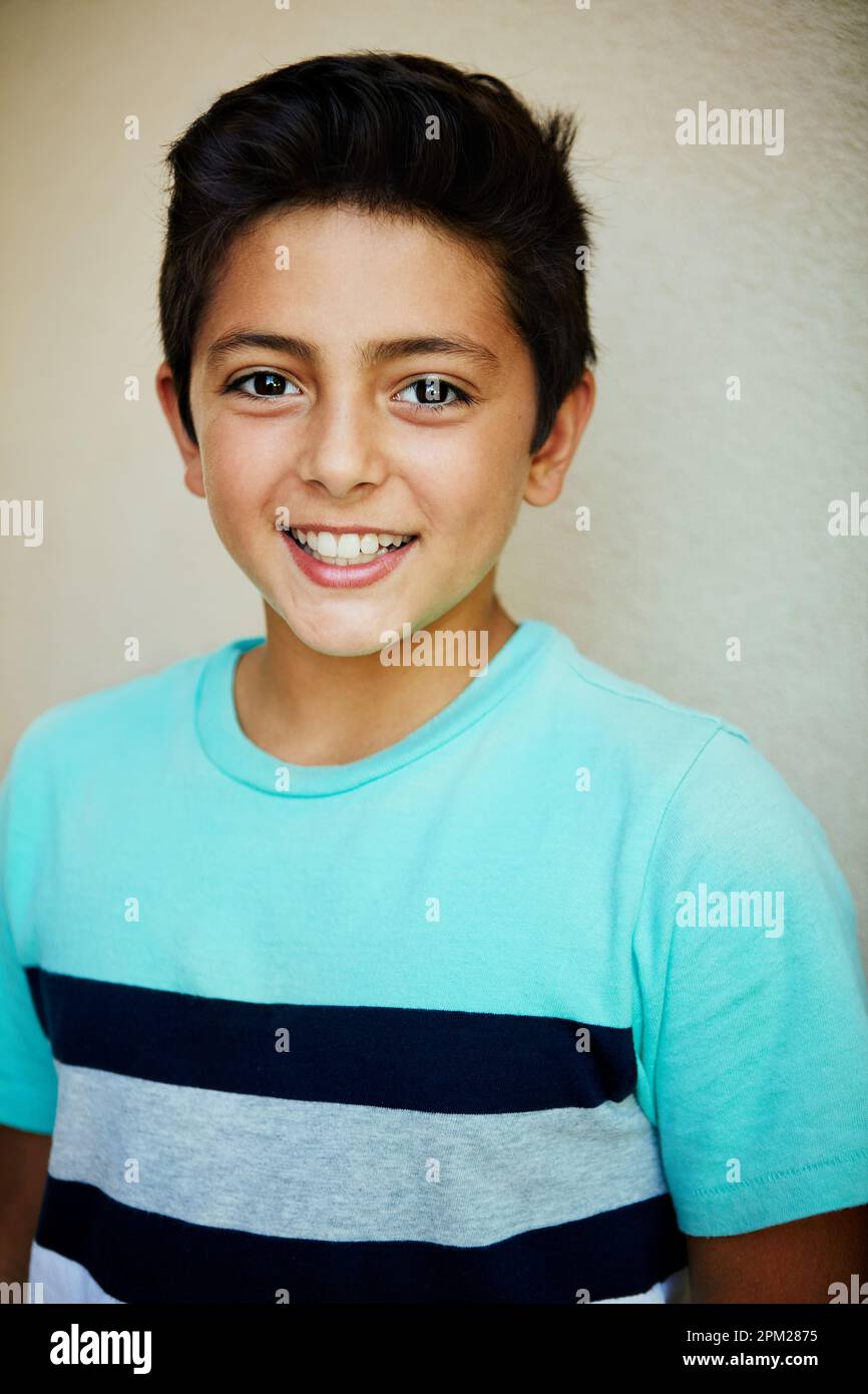 What a cool guy. Studio portrait of a young boy giving you a big smile ...