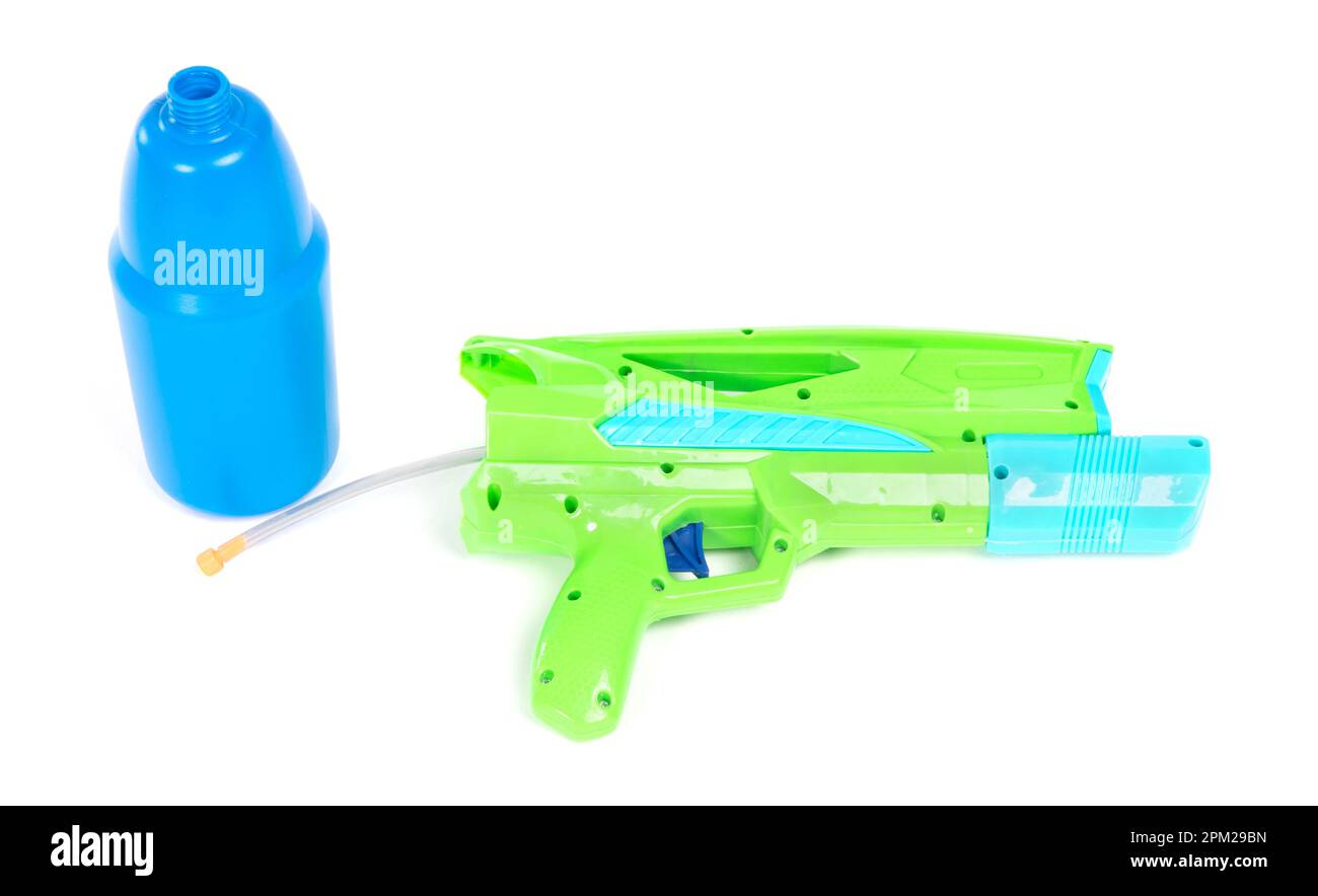 Plastic water gun isolated over white background Stock Photo - Alamy