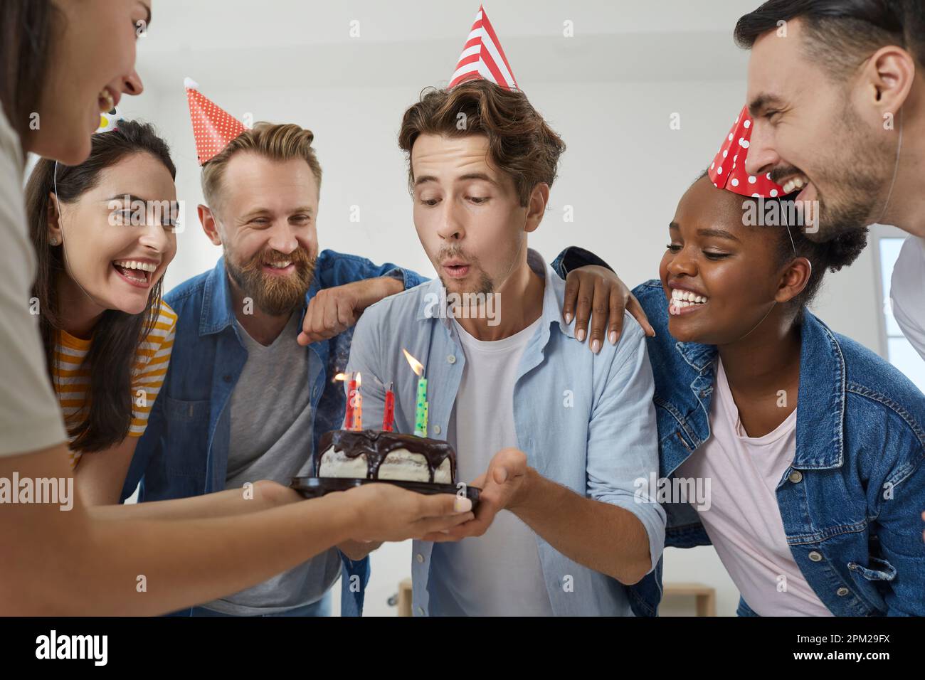 Portrait of smiling laughing young people dressed in casual clothes and ...