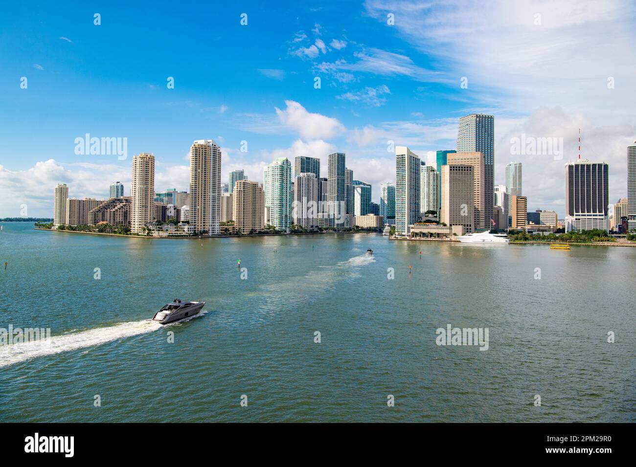miami metropolis skyline with boat. photo of miami metropolis skyline ...