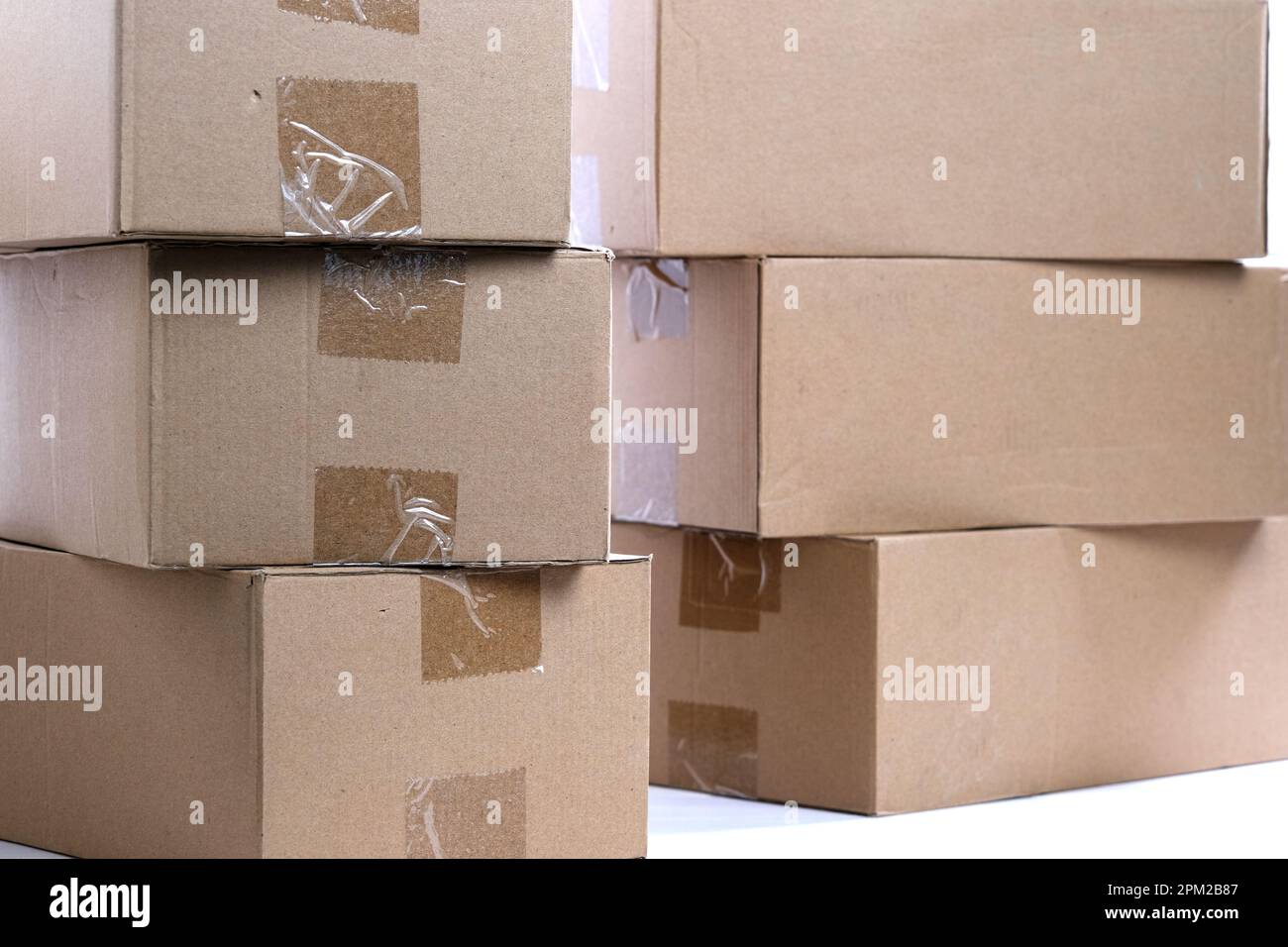Lots of cardboard boxes on the table Stock Photo - Alamy