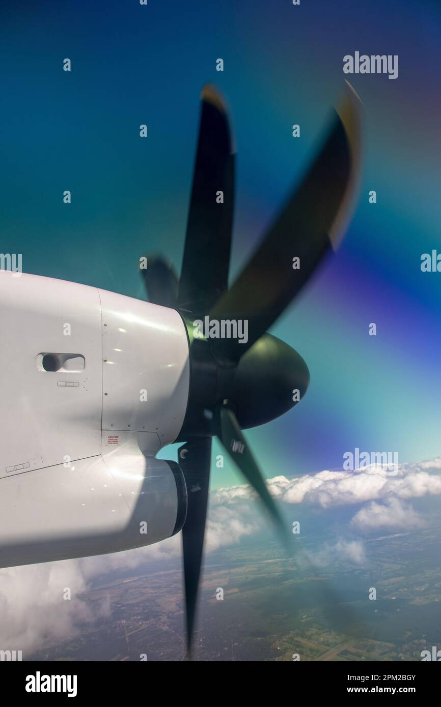 View from the window of an aircraft of a wing to which a propeller ...