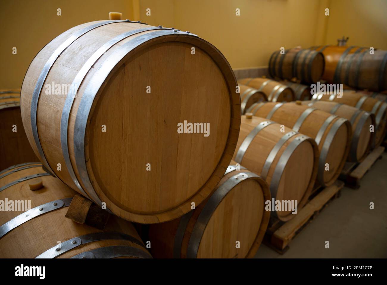 Oak Barrels wine fermenters in a winery Stock Photo - Alamy