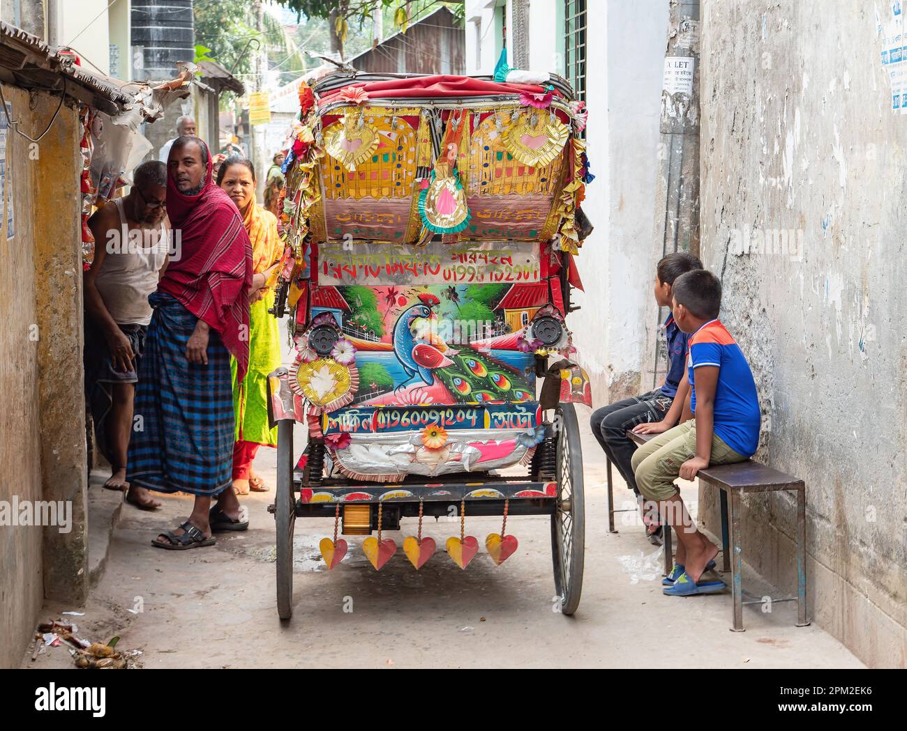 Tricycle taxi at a narrow street in Dhaka, Bangladesh Stock Photo - Alamy