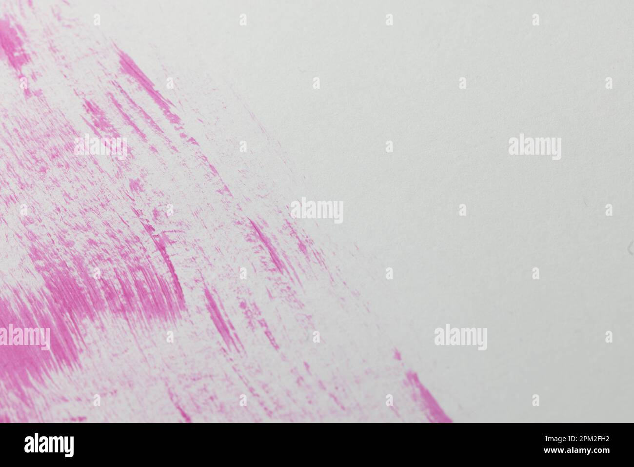 Close up of pink paint shapes on white background with copy space Stock ...