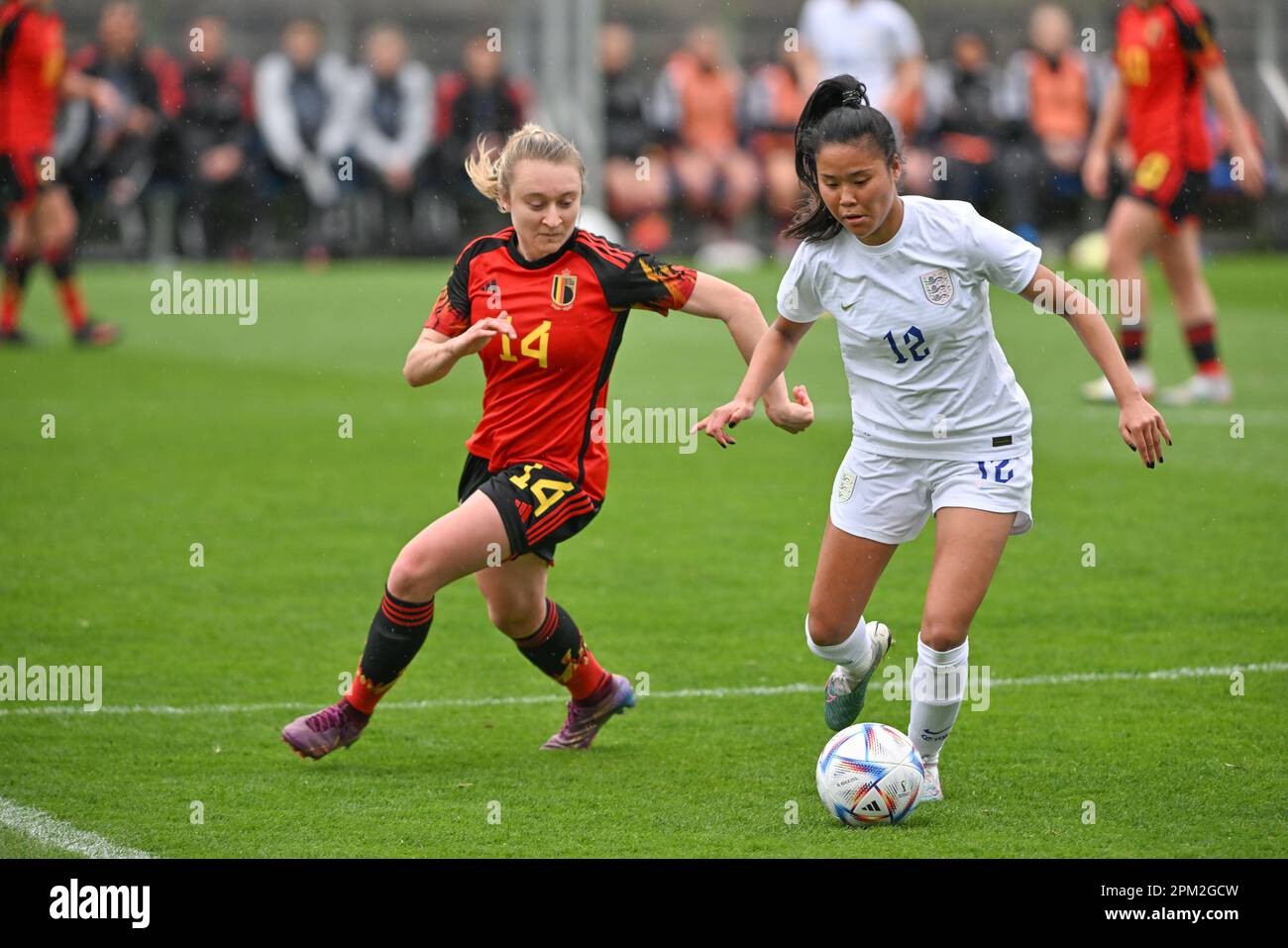 Gwyneth Vanaenrode (14) of Belgium and Asmita Ale (12) of England ...