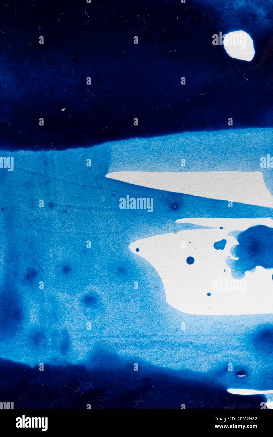 Close up of blue paint shapes on white background with copy space Stock ...