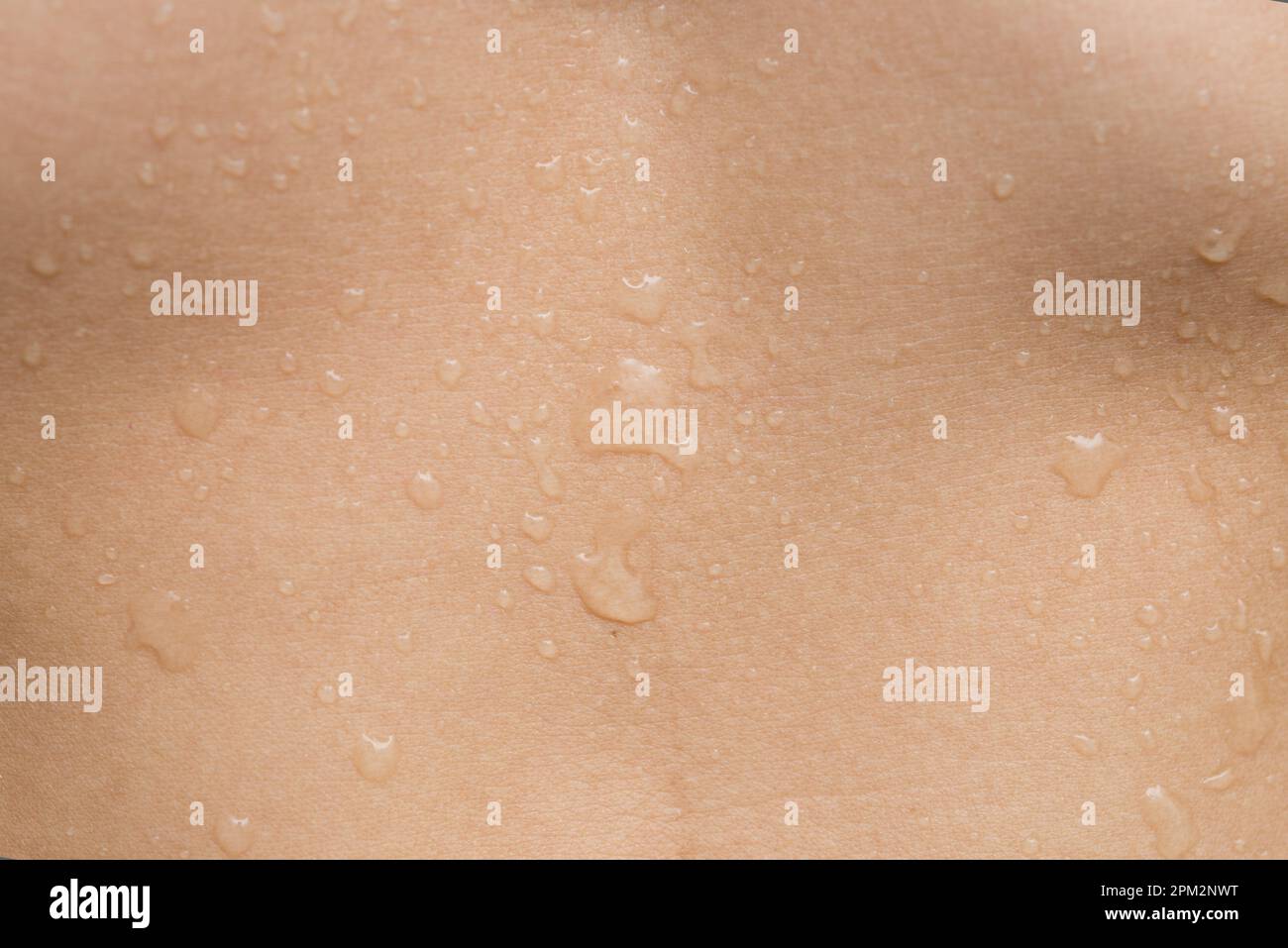 Water drops on skin Stock Photo - Alamy