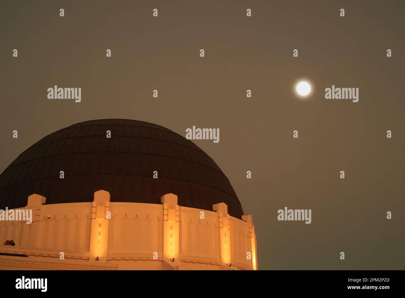 The grandeur of Griffith Observatory stands out against a moonlit night ...