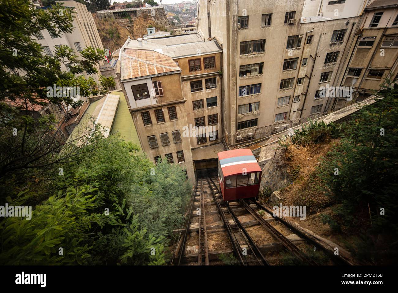 Rack and pinion funicular climbing the slope to higher housing on the ...