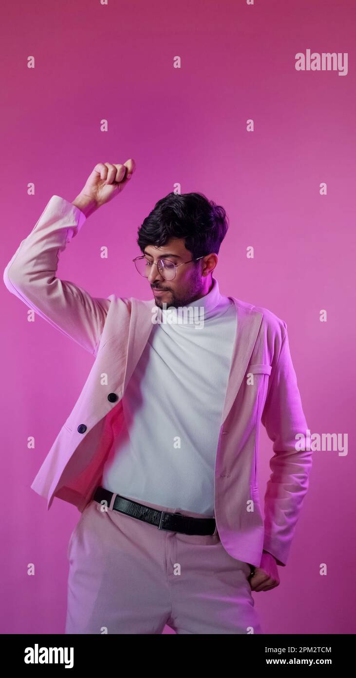 Disco guy party entertainment pink neon dancing Stock Photo - Alamy