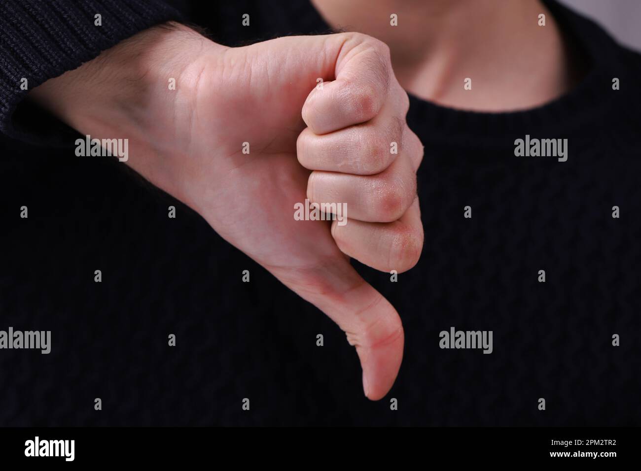 Businessman thumbs down hi-res stock photography and images - Alamy