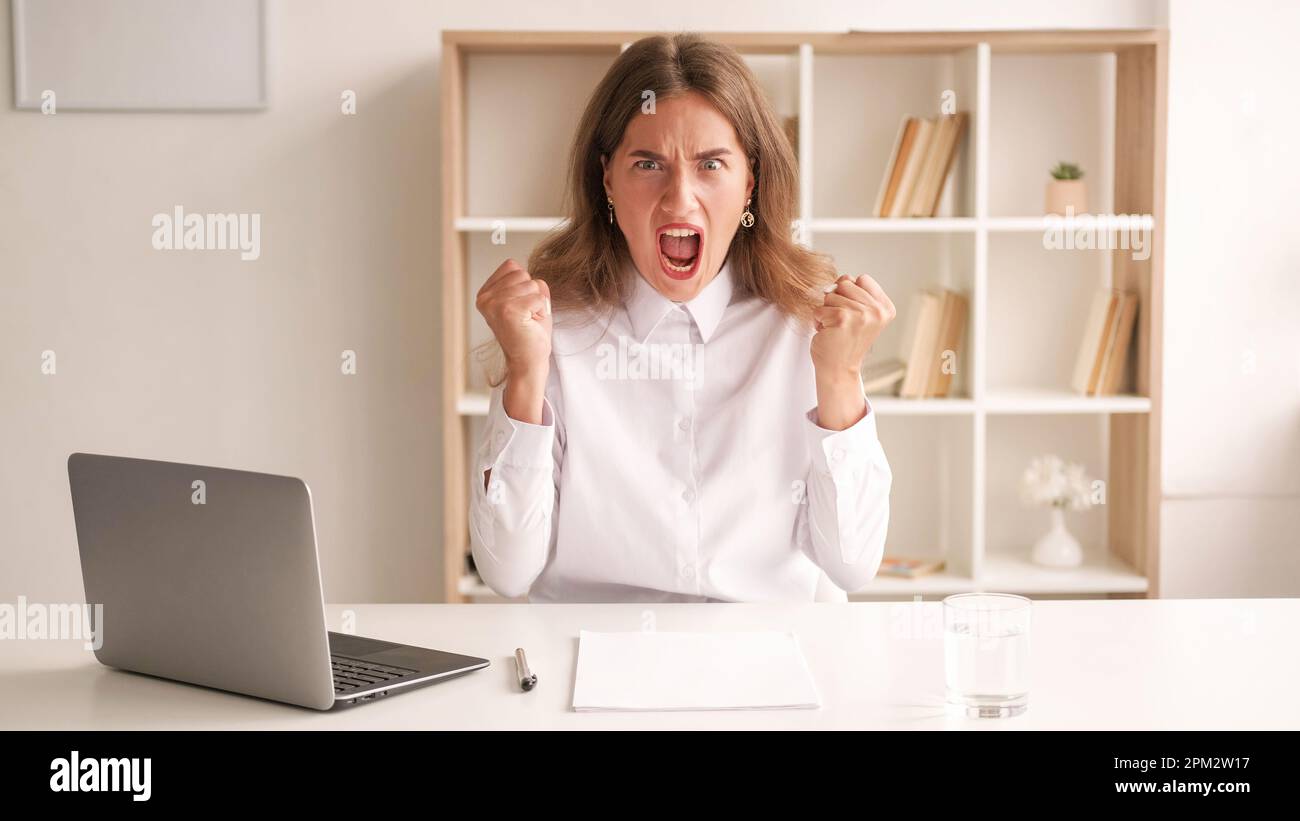 Furious anger office woman work difficulties Stock Photo - Alamy