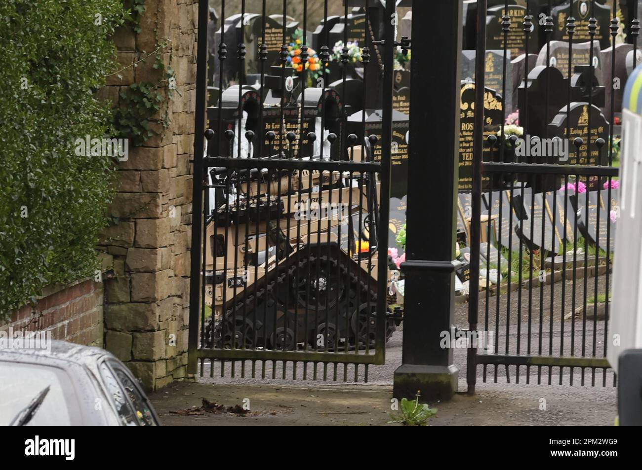 An army robot is used to check for devices at Derry City Cemetery ...