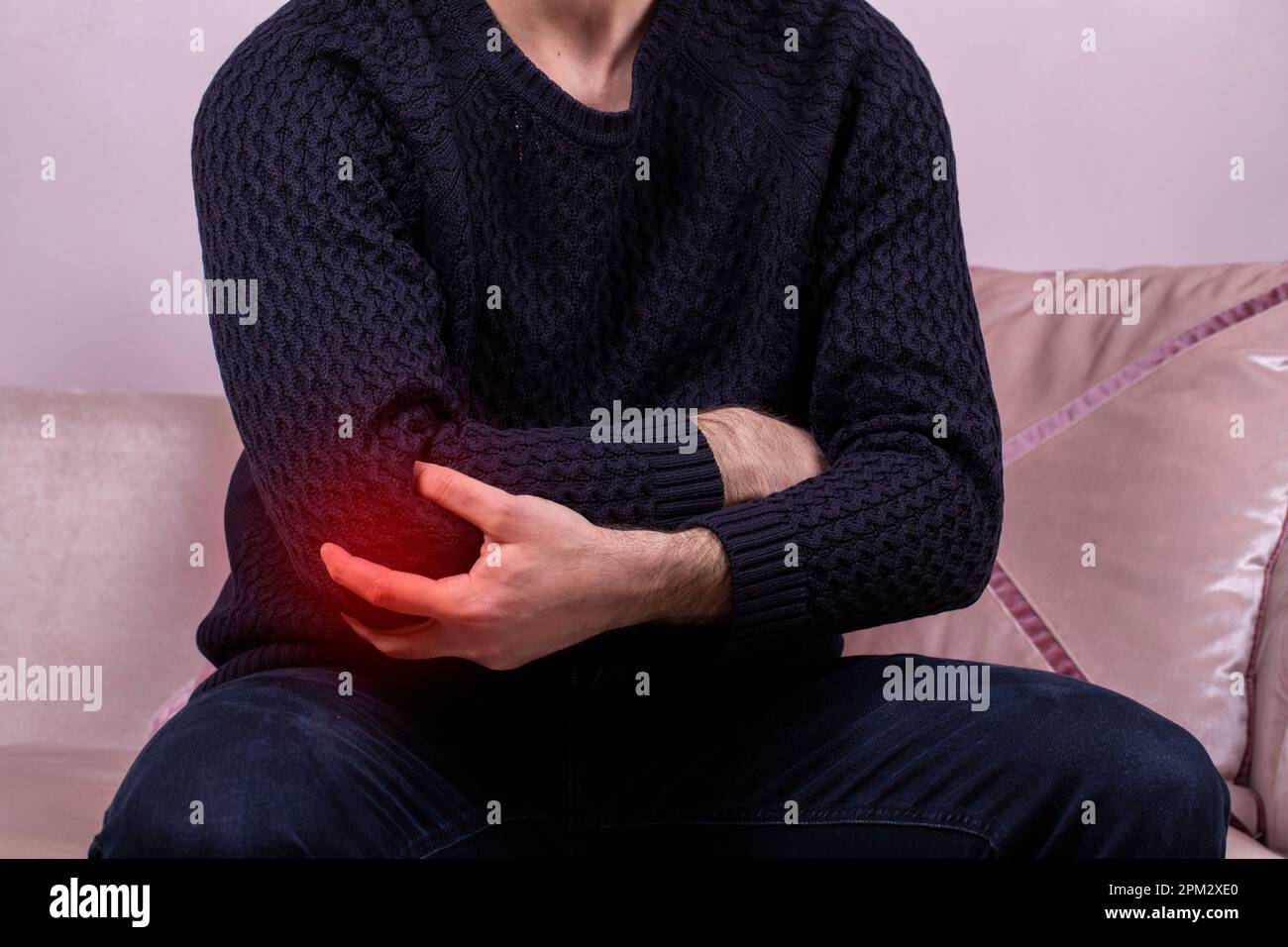 Male elbow pain. People, healthcare and problem concept - close up of ...