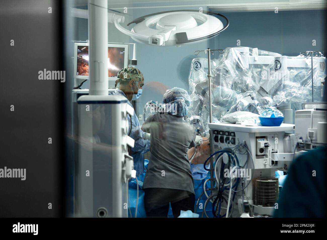 Carrying out an operation using a robot, a robot surgeon with ...