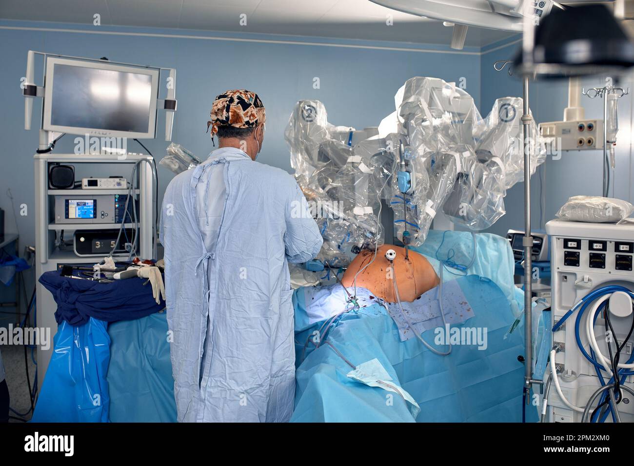 Surgical system with minimally invasive robot in a hospital. Robotic ...