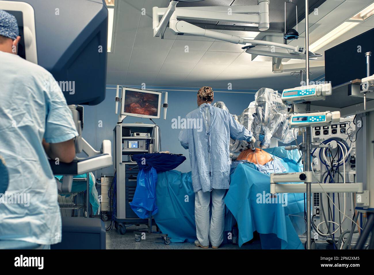 Carrying out an operation using a robot, a robot surgeon with ... Carrying out an operation using a robot, a robot surgeon with ...
