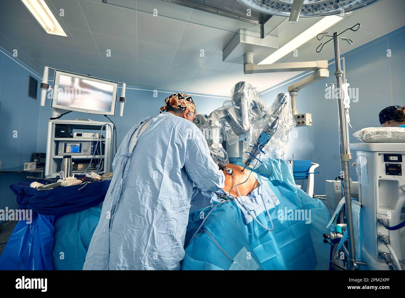 Surgical system with minimally invasive robot in a hospital. Robotic ...