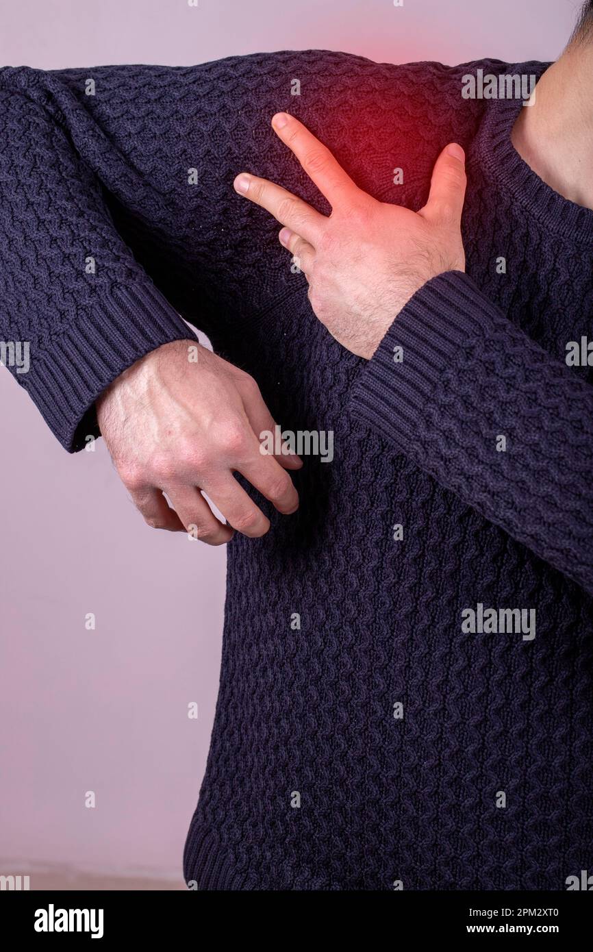 Male shoulder pain. People, healthcare and problem concept - close up ...