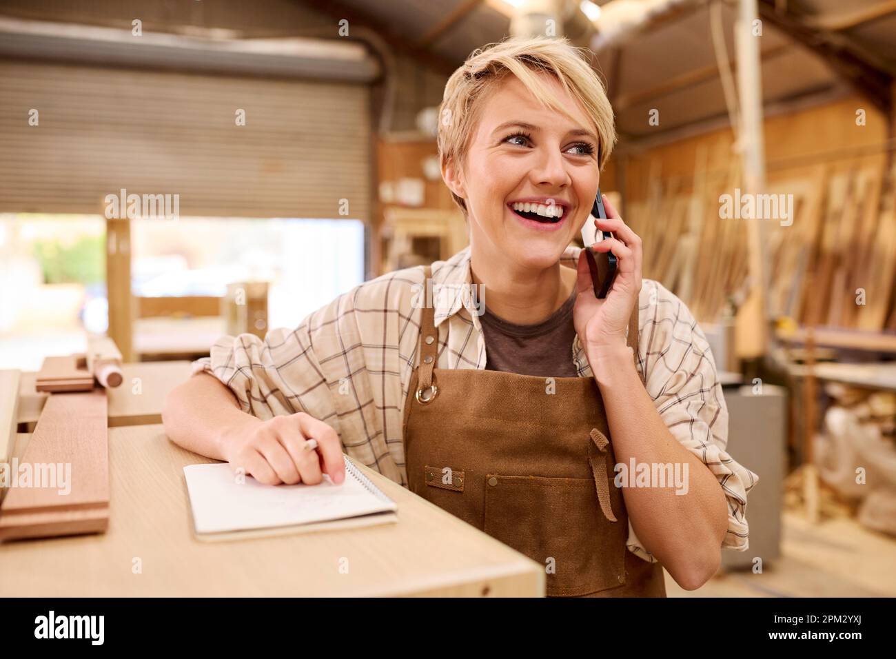 Female apprentice making notes learning hi-res stock photography and ...