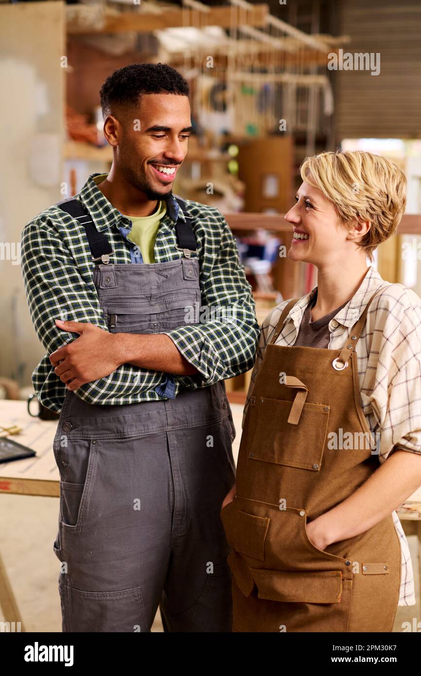Male female apprentices working carpenters hi-res stock photography and ...