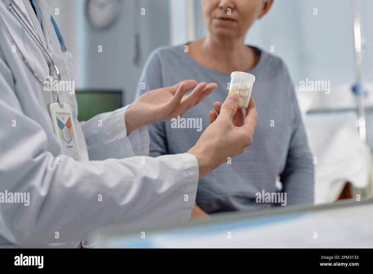 Woman doctor prescribing medicine elderly hi-res stock photography and ...