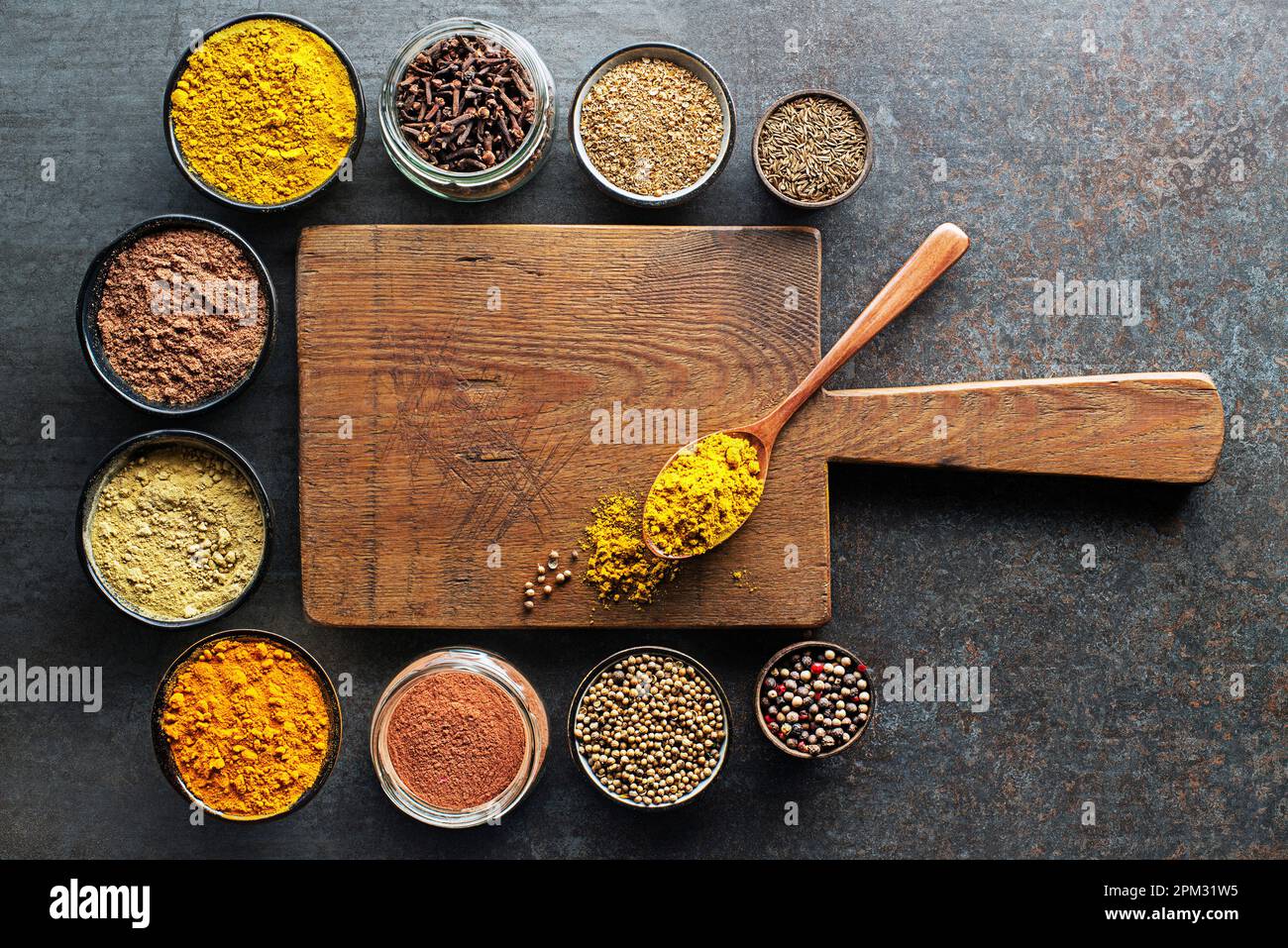 Colorful herbs and spices for cooking Indian dishes. Indian spices On ...