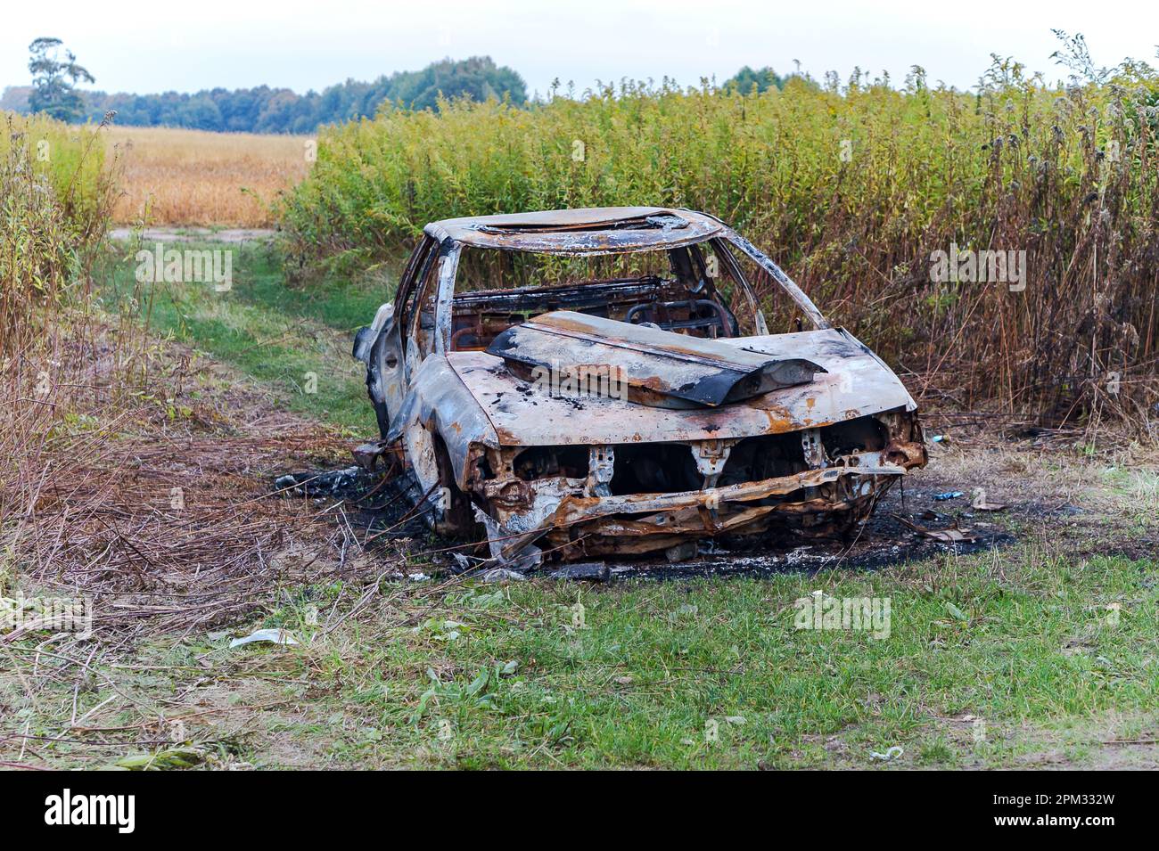 A burnt-out car. Car old burned by fire. Fire burned car Stock Photo ...