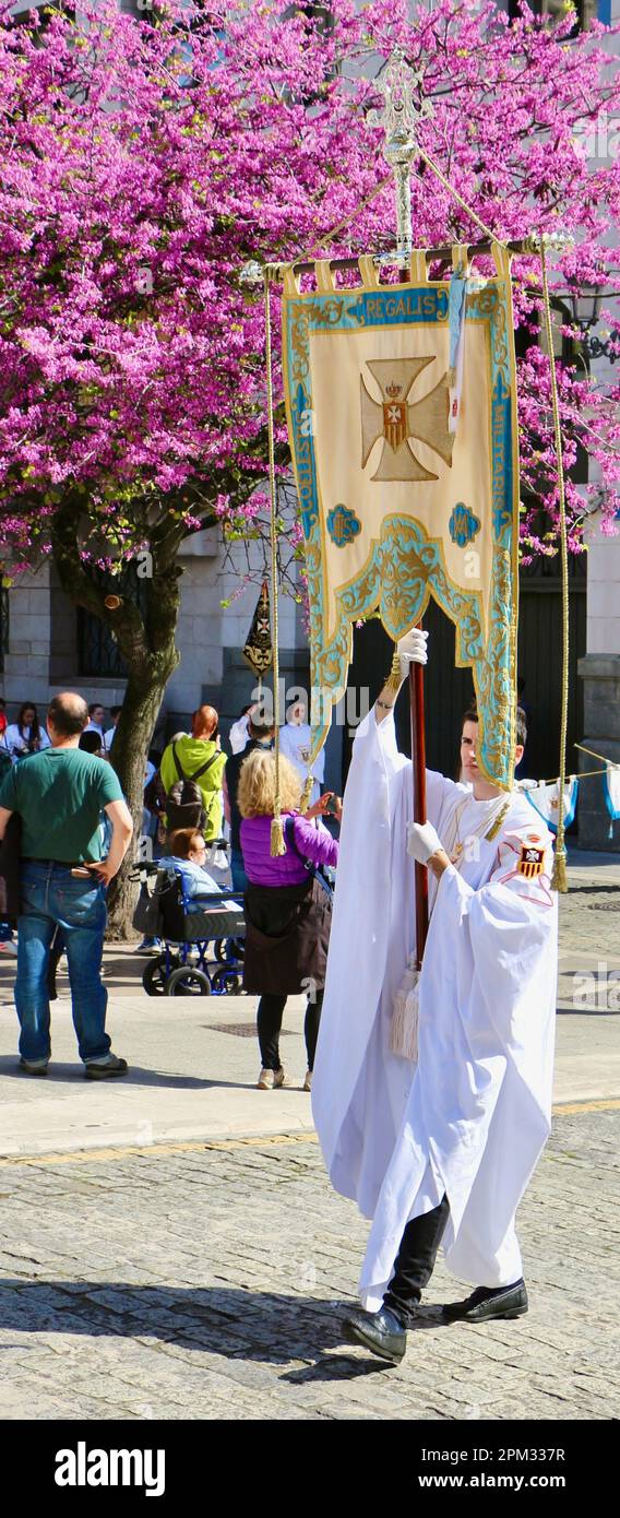 Easter Sunday procession with participant dressed in long robes ...