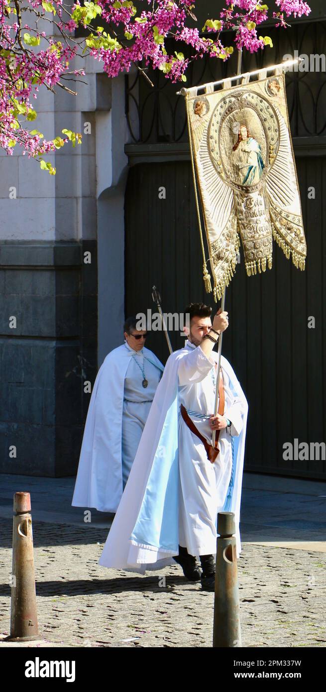 Easter Sunday procession with participant dressed in long robes ...