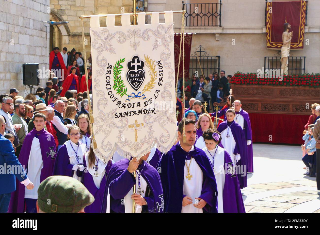 Participants in the Easter Sunday procession with a sculpture of Jesus ...