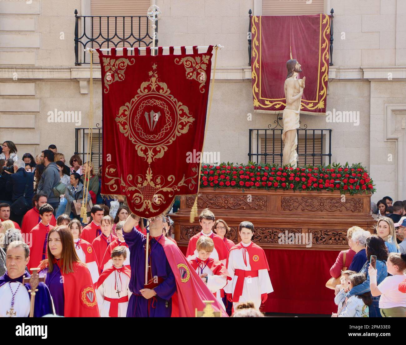 Participants in the Easter Sunday procession with a sculpture of Jesus ...