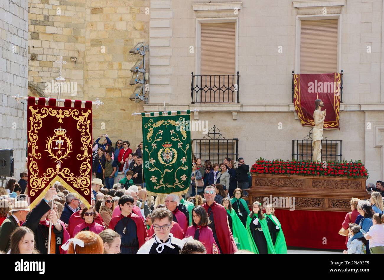 Participants in the Easter Sunday procession with a sculpture of Jesus ...