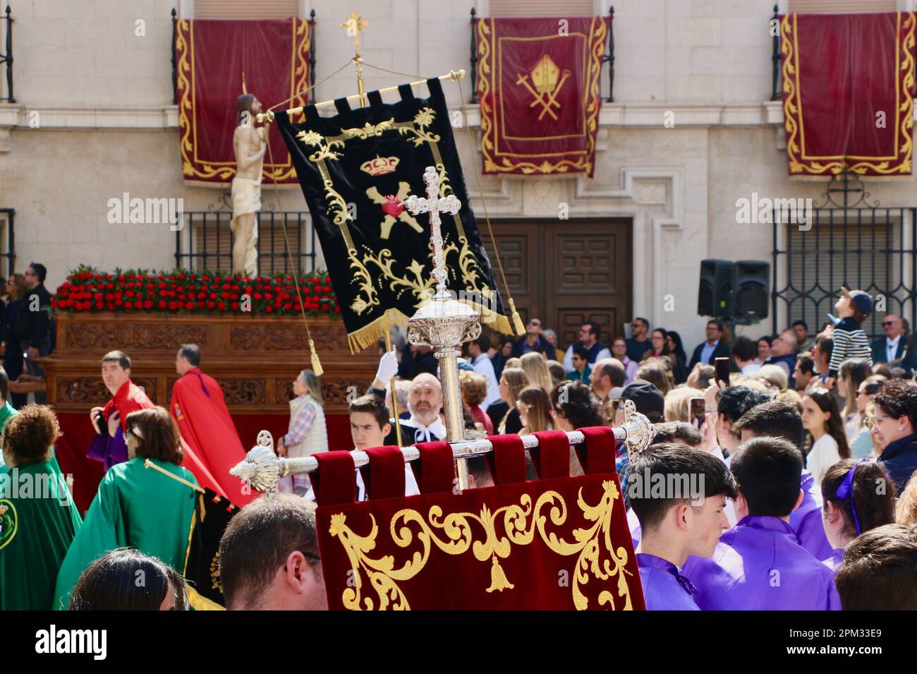 Participants in the Easter Sunday procession with a sculpture of Jesus ...
