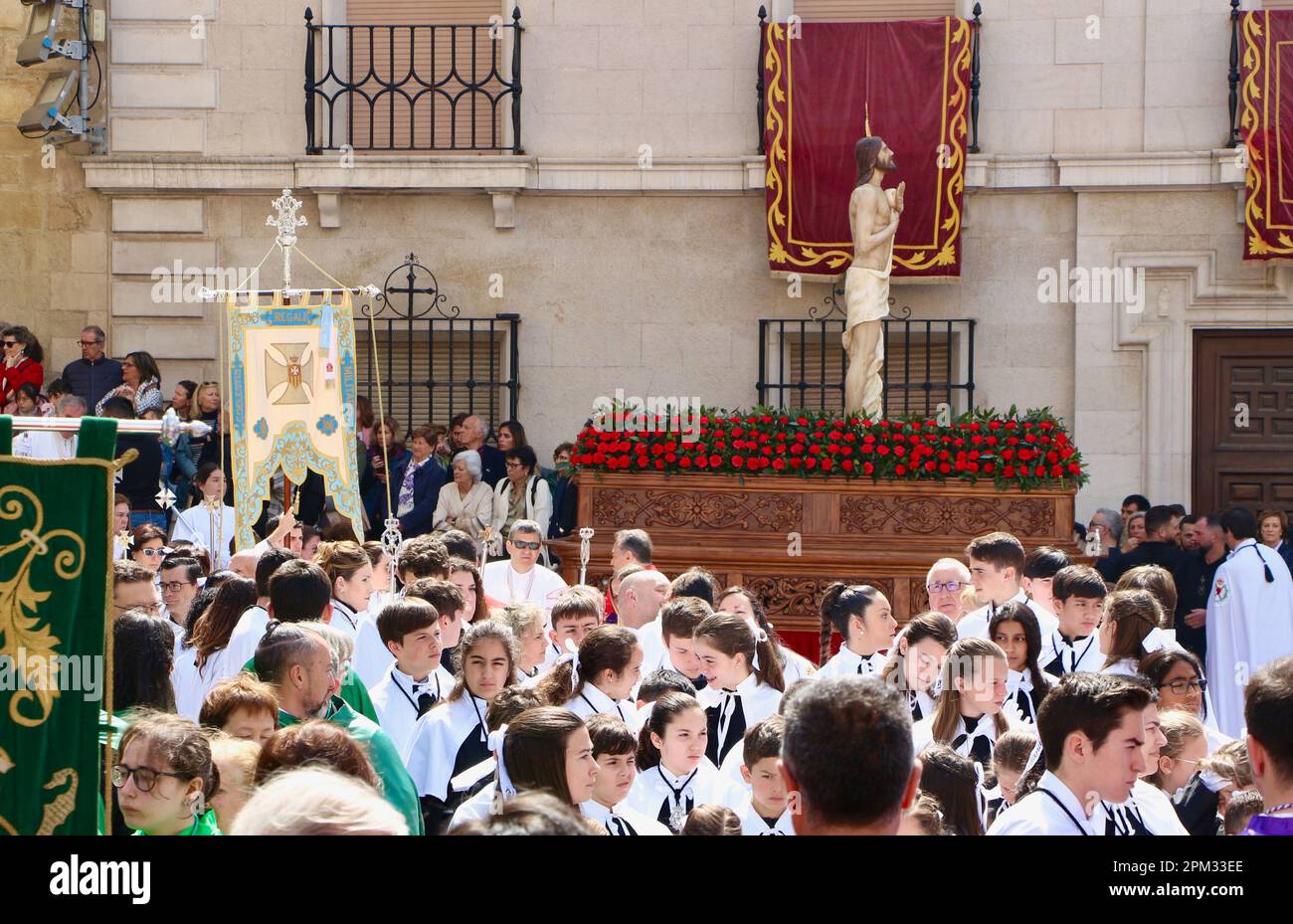 Participants in the Easter Sunday procession with a sculpture of Jesus ...