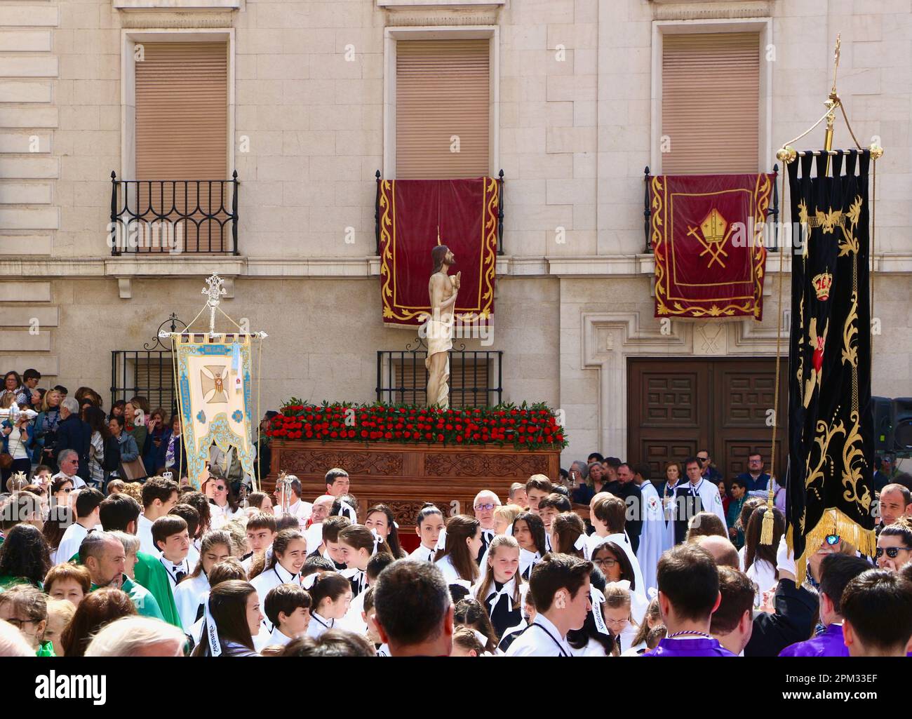 Participants in the Easter Sunday procession with a sculpture of Jesus ...
