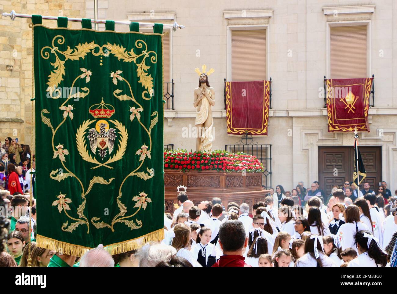 Participants in the Easter Sunday procession with a sculpture of Jesus ...
