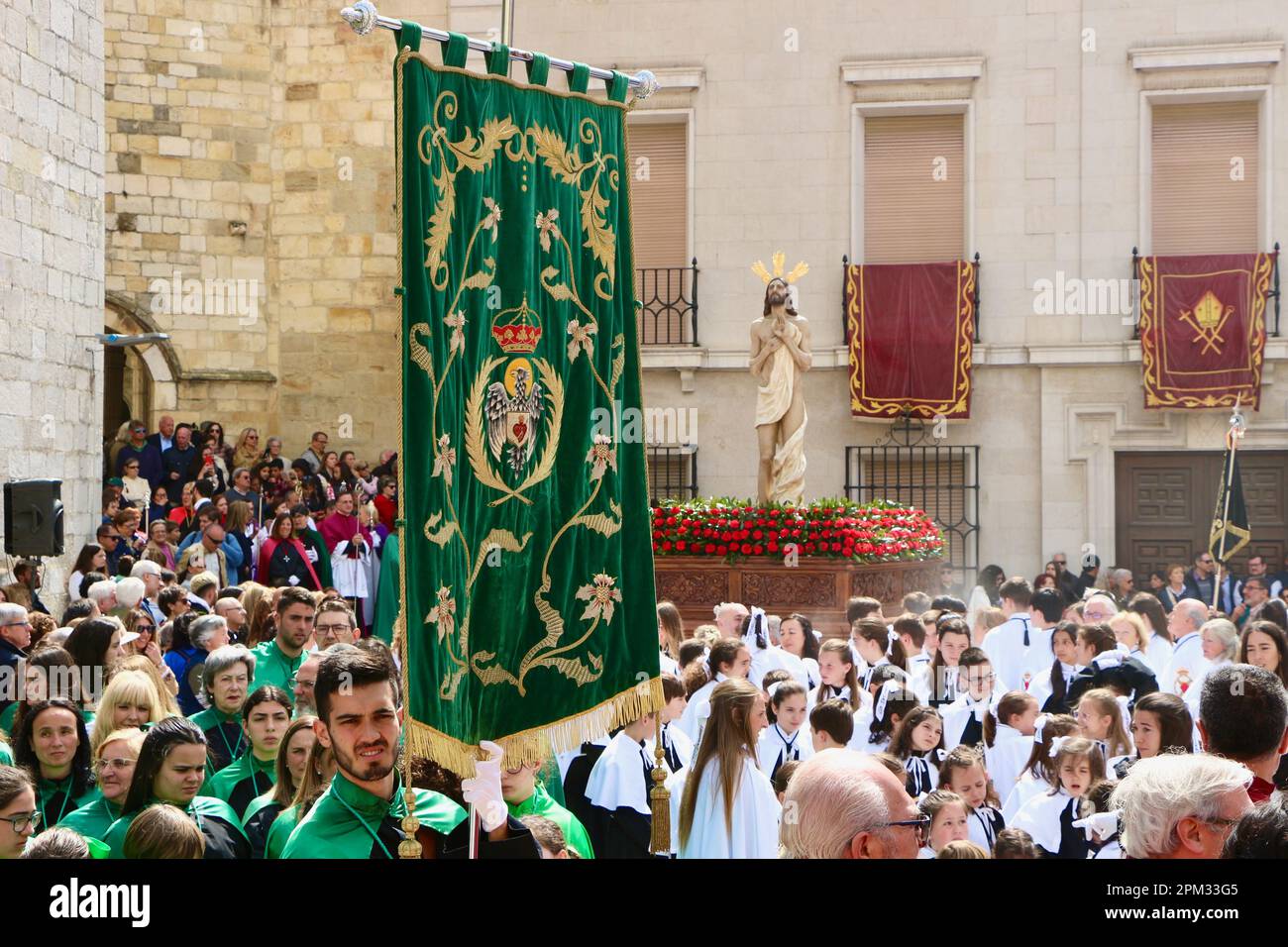 Participants in the Easter Sunday procession with a sculpture of Jesus ...