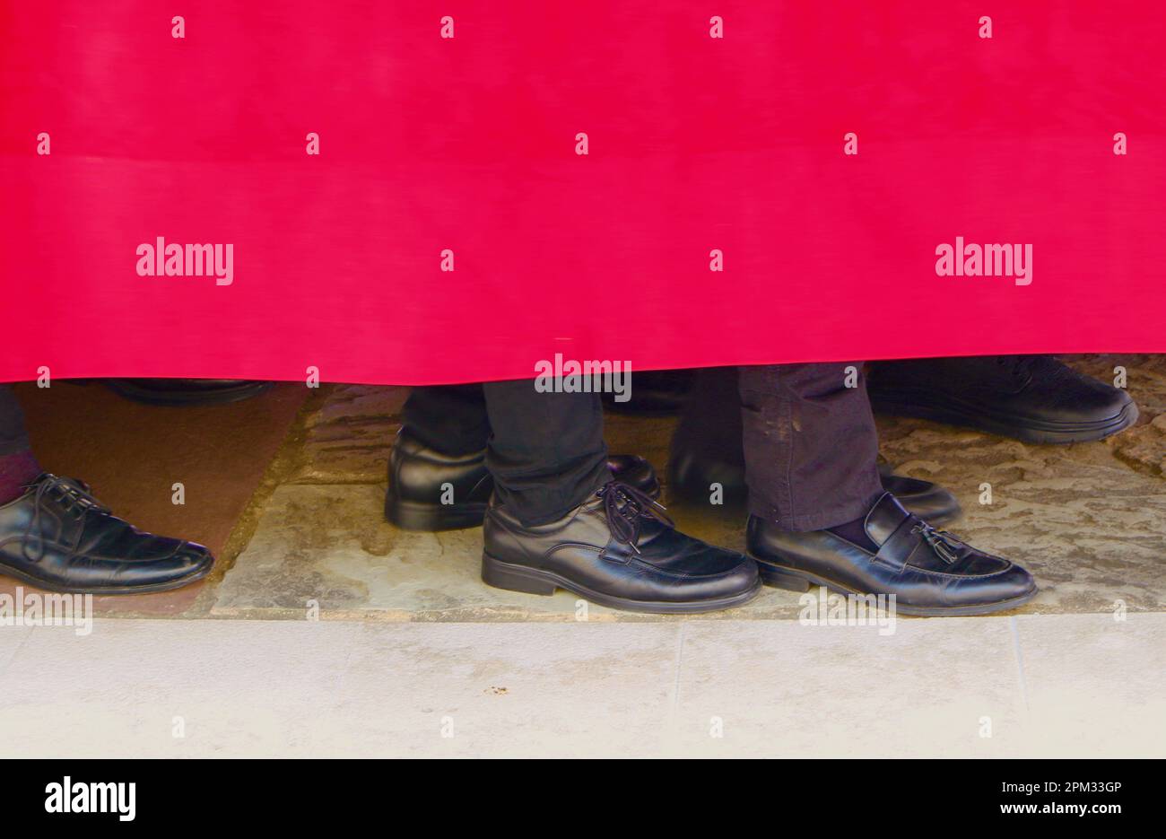 Float bearers costaleros feet under the float for a sculpture of the ...