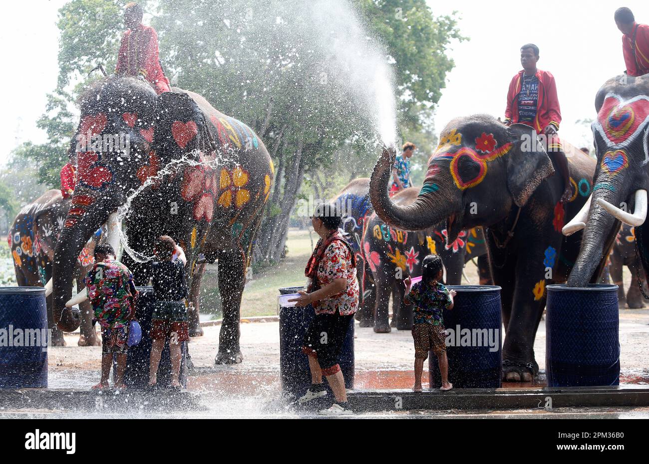 Elephants with children hi-res stock photography and images - Alamy