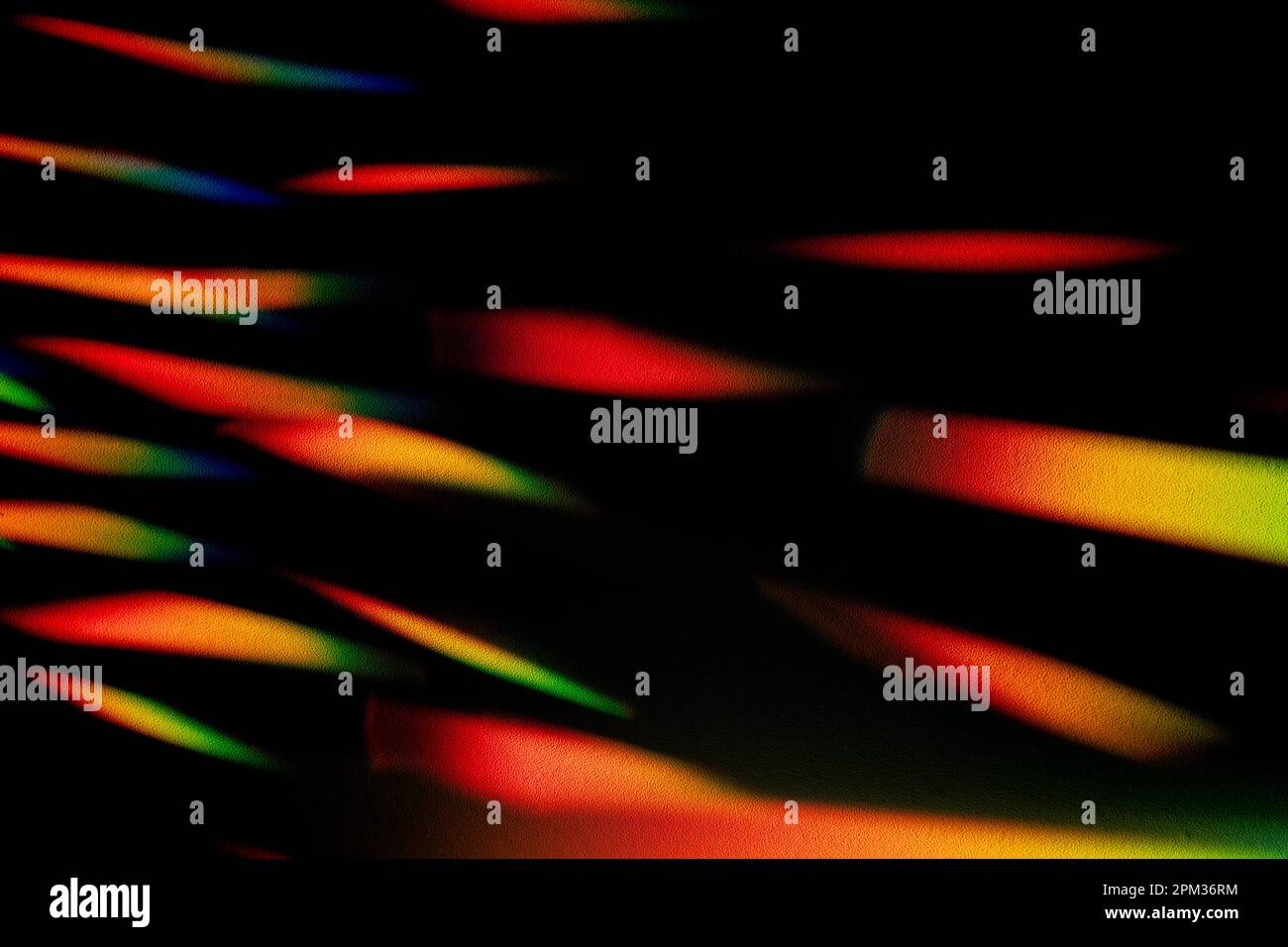 Red and green Prism Rainbow refraction Specs on black Background ...