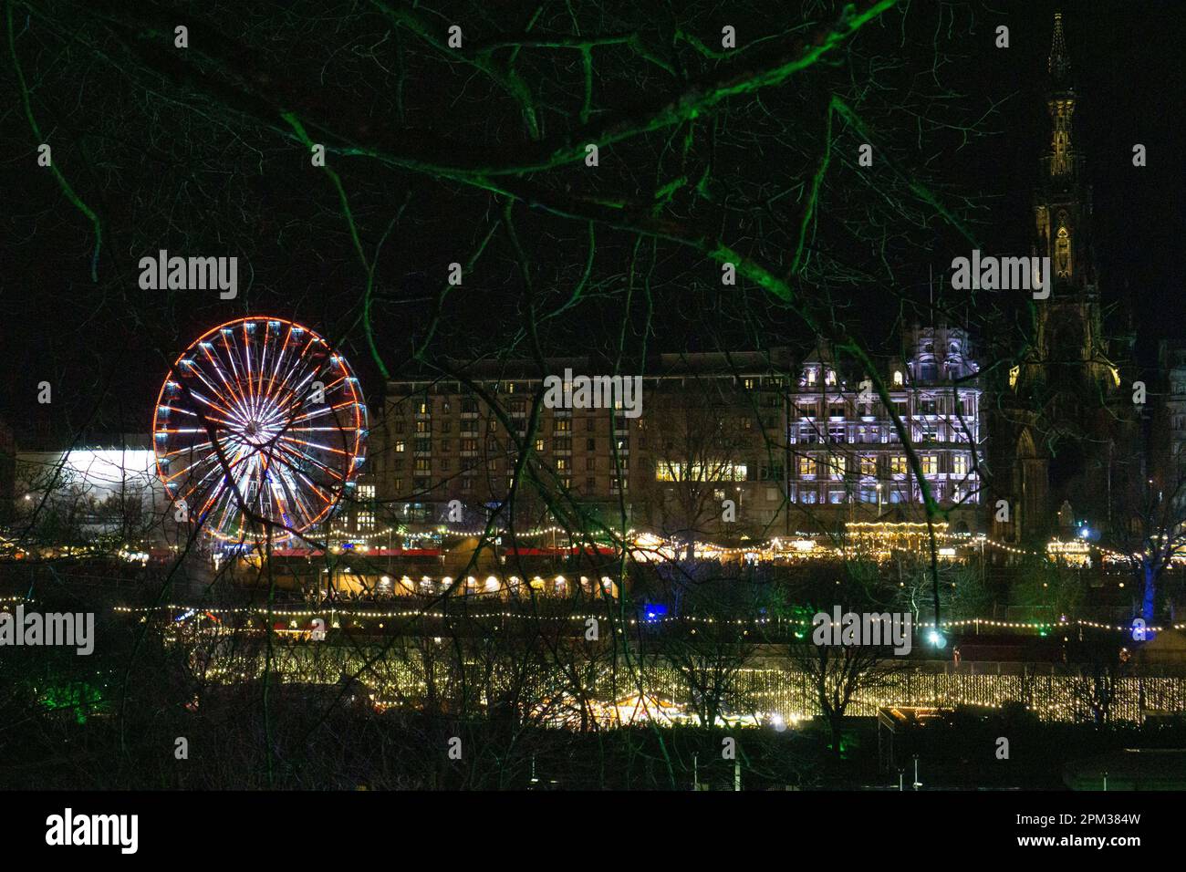 A view of Edinburgh, Scotland, UK's Christmas market at night ...