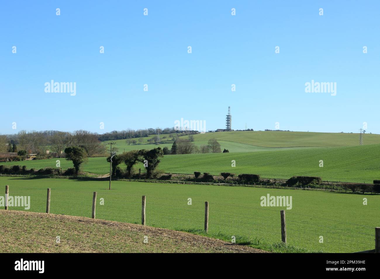 View across fields to Tolsford Hill and mast from above New Barn ...