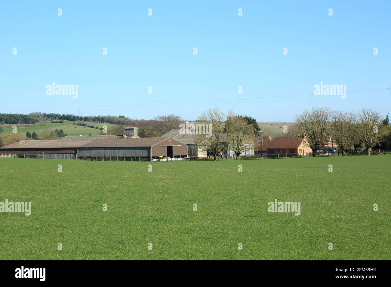 Field and farm buildings at Court Lodge Farm on the Kent North Downs ...